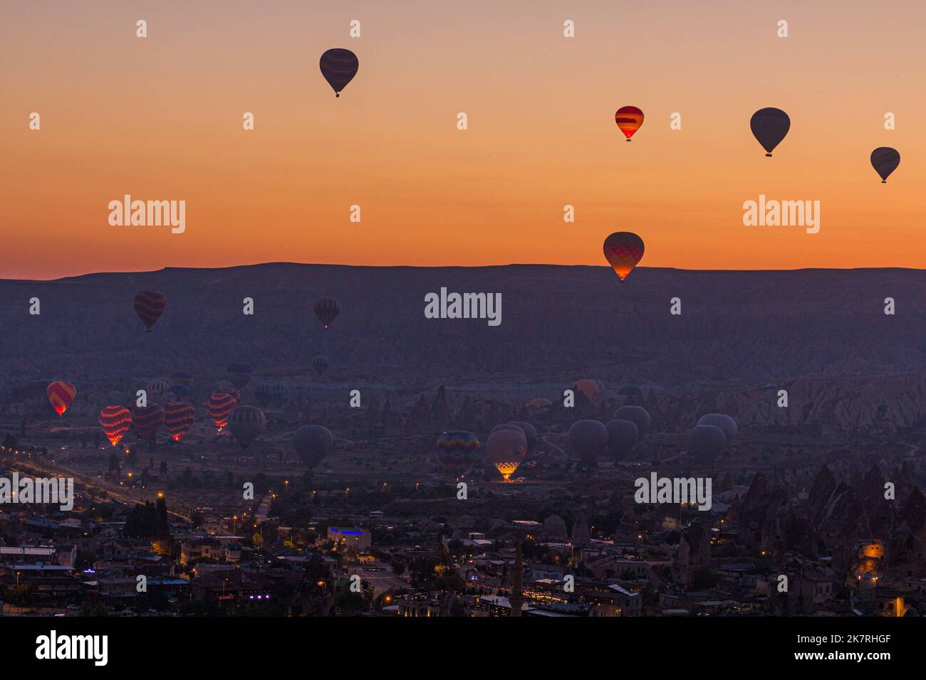 Early morning view of hot air balloons above Goreme village in ...