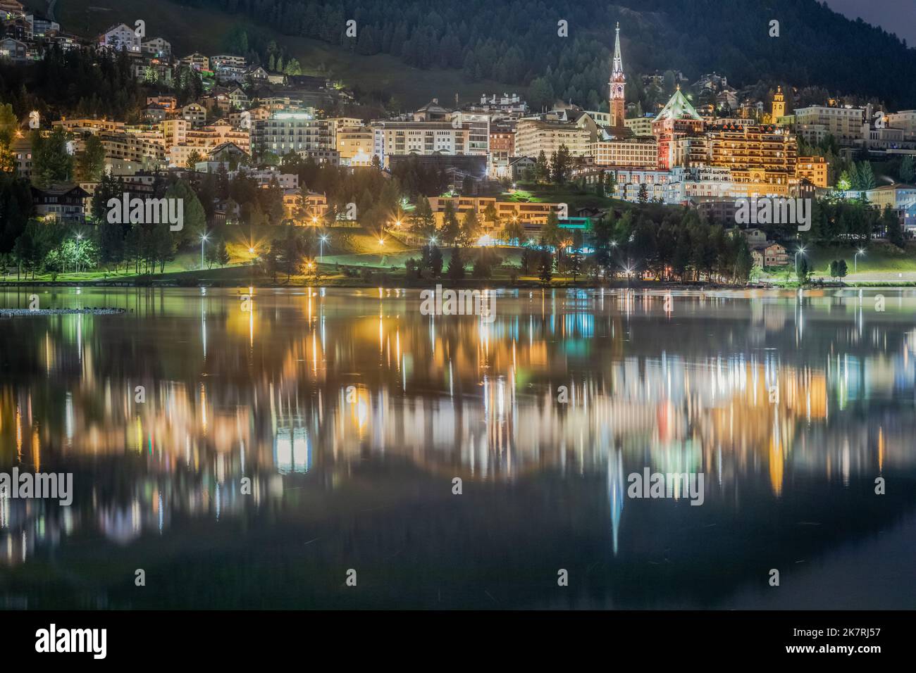 St Moritz cityscape and lake reflection at night, Engadine, Swiss alps ...