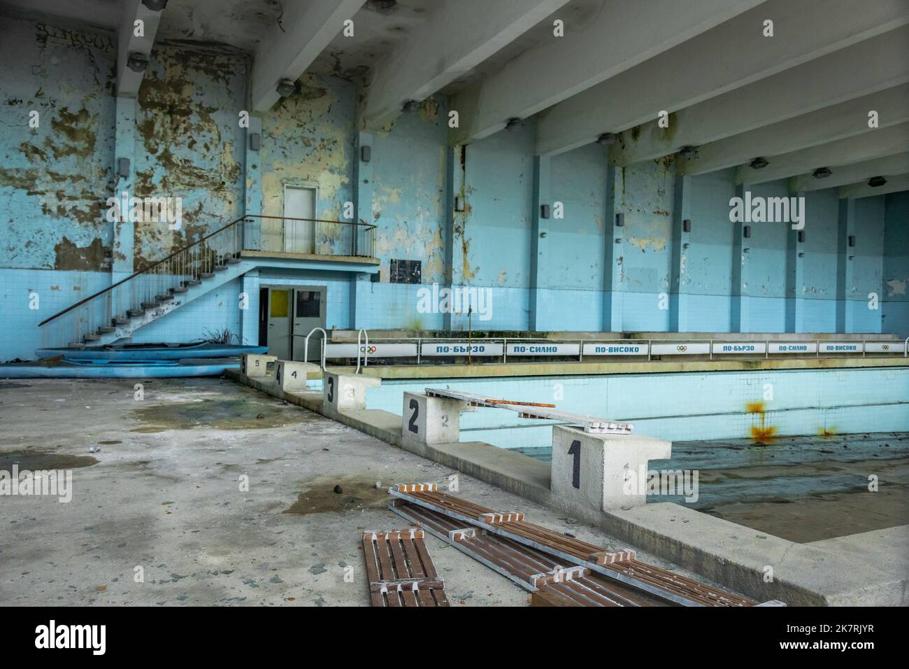 Derelict building indoors with abandoned swimming pool like Chernobyl ...
