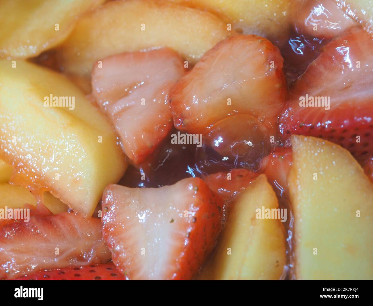 Food, Tutti Frutti, stewing apples, pears and strawberries boiling in a ...