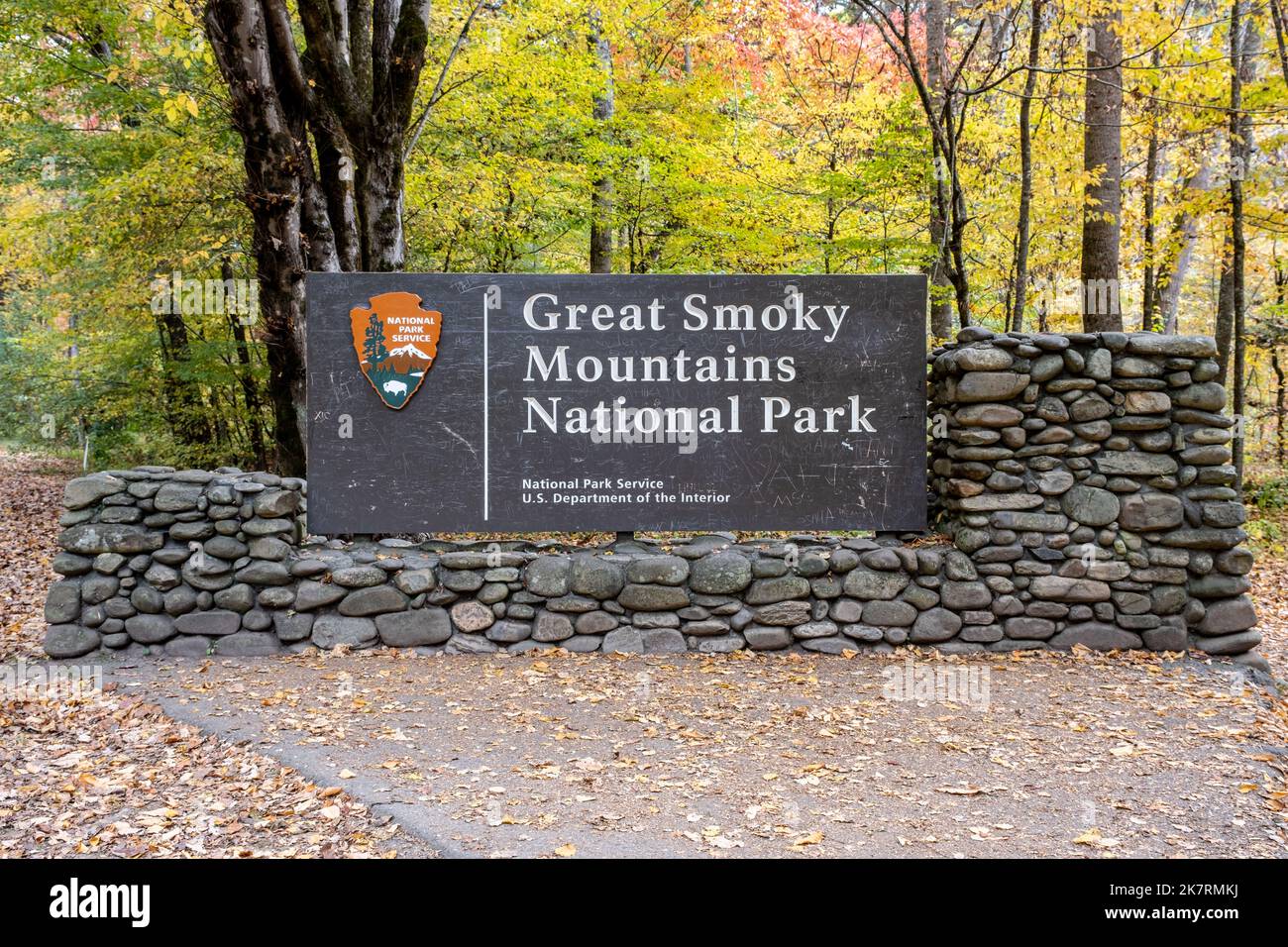 Great Smoky Mountains National Park Sign on a stone base marking the ...