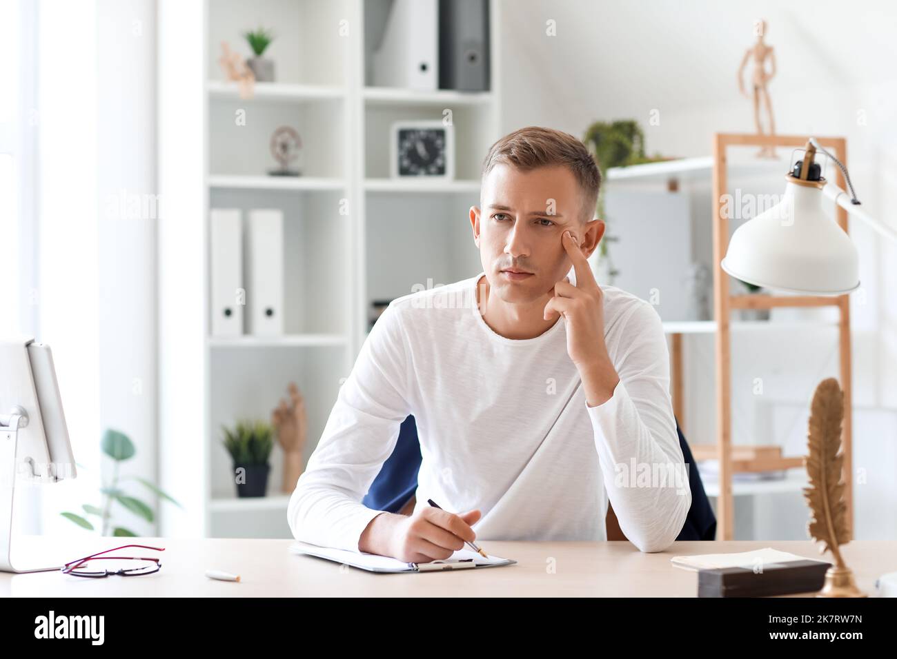 Young man writing sad hi-res stock photography and images - Alamy