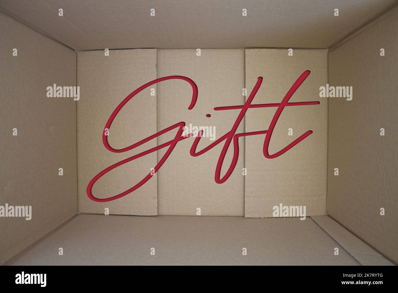 Gift word with cardboard box. Brown folded card box Stock Photo - Alamy