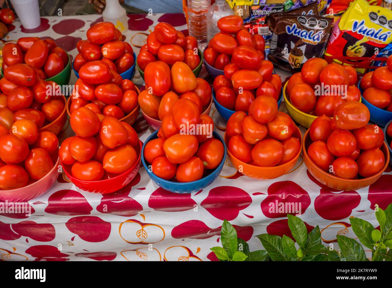Tomatoes for sale on the weekly indigenous market in the small town of ...