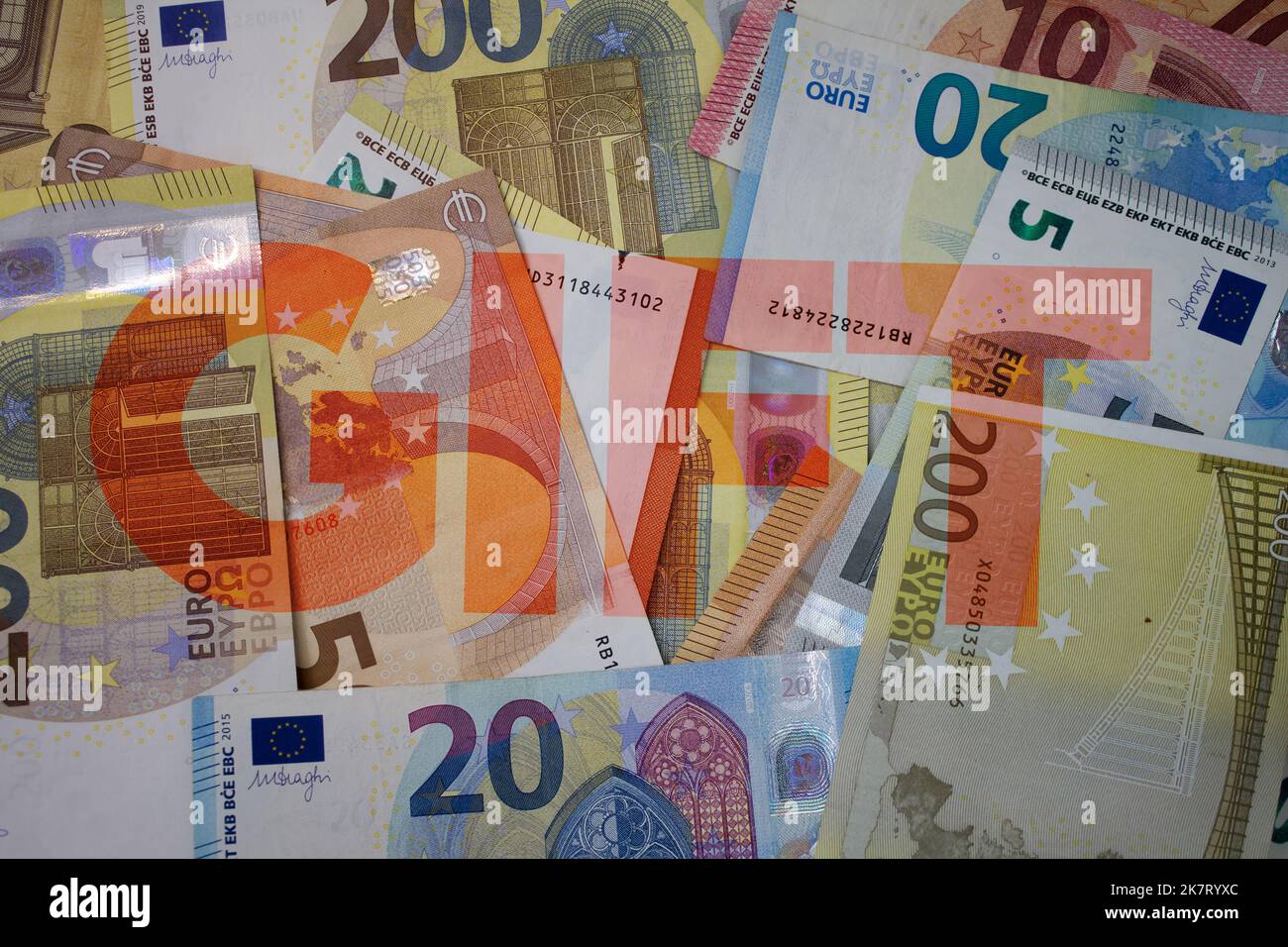 Gift word with money. Paper currency background with different ...