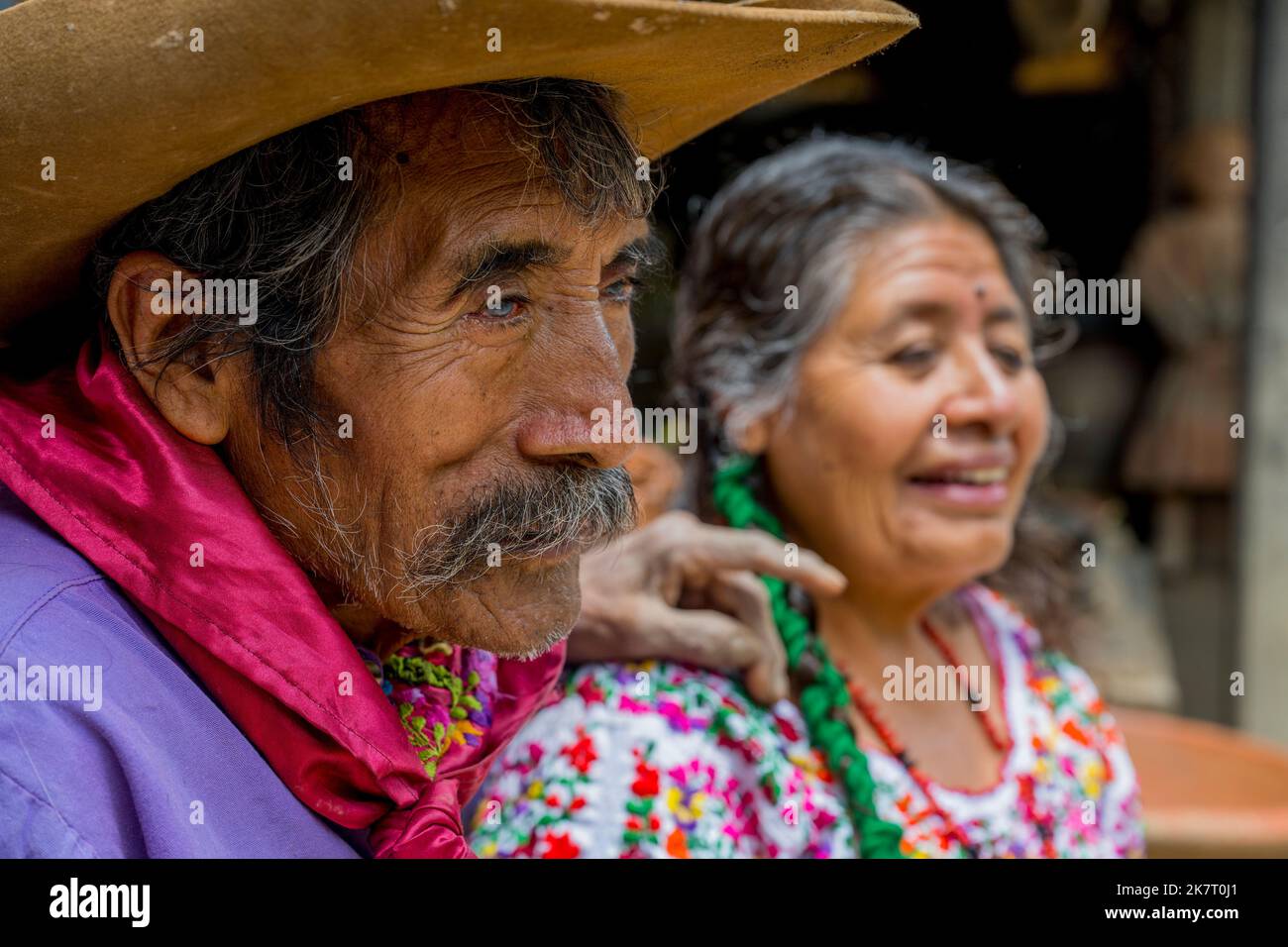 Don Jose Garcia, known as the blind potter, works with his wife ...