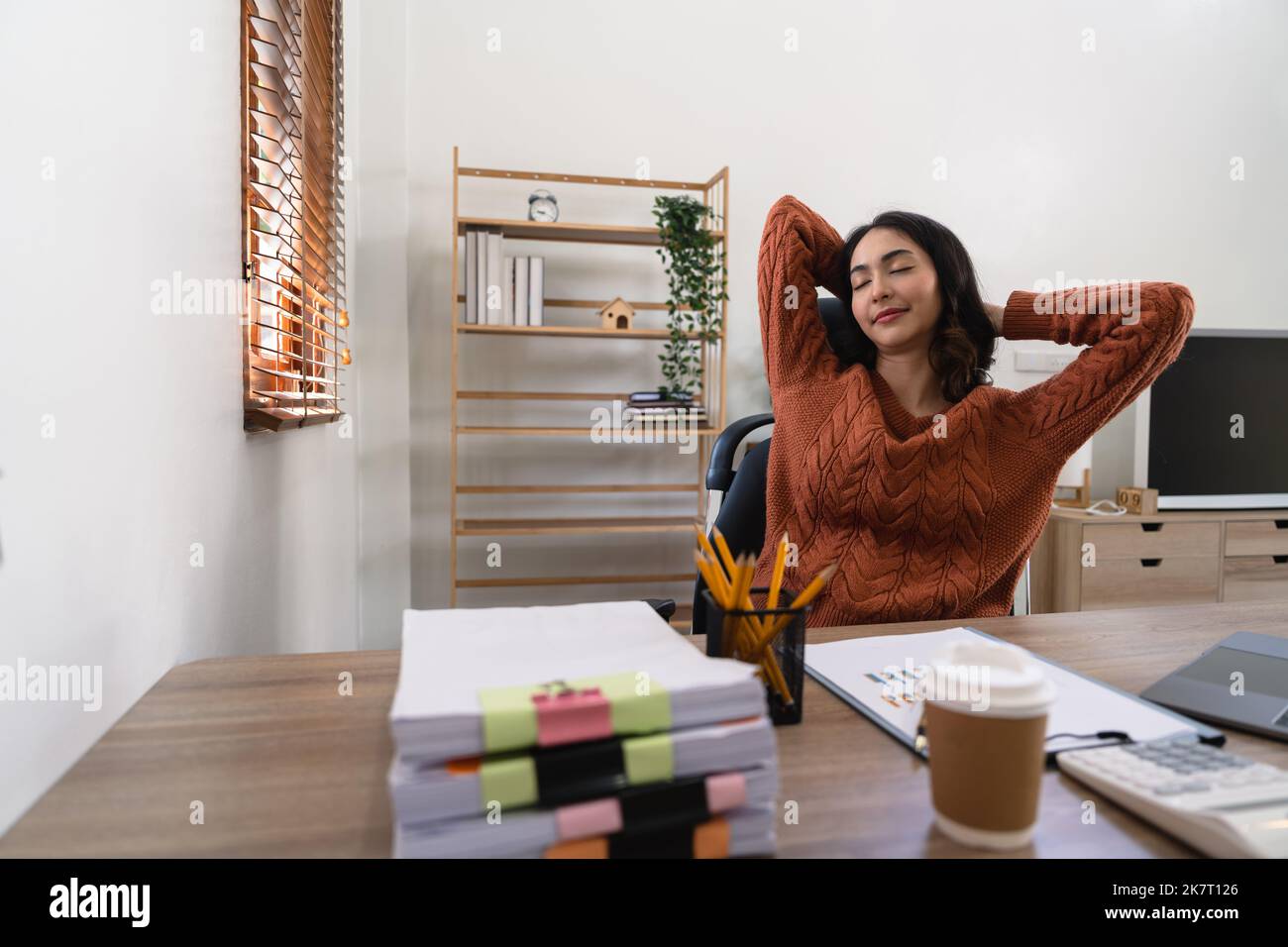 Young business asian woman relaxing at workplace in office Stock Photo ...