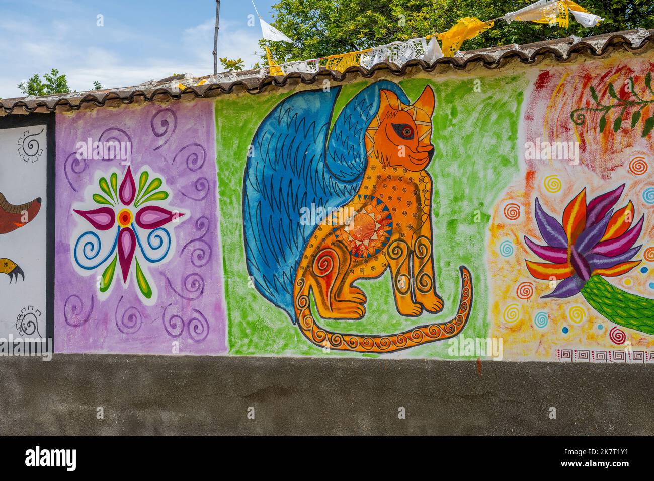 Colorful murals in the Zapotec wood carving village of San Martin ...