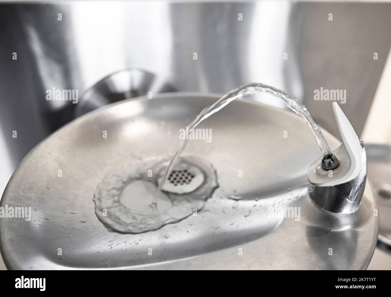 Indoor Drinking Fountain with Running Water and shallow depth of field ...