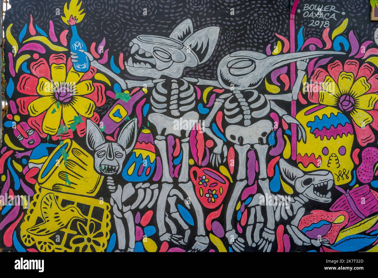 Many houses are painted with colorful murals in Barrio de Jalatlaco, in ...