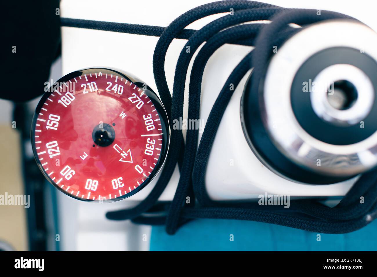 Yacht equipment compass, sailboat winch and rope. Front view Stock ...