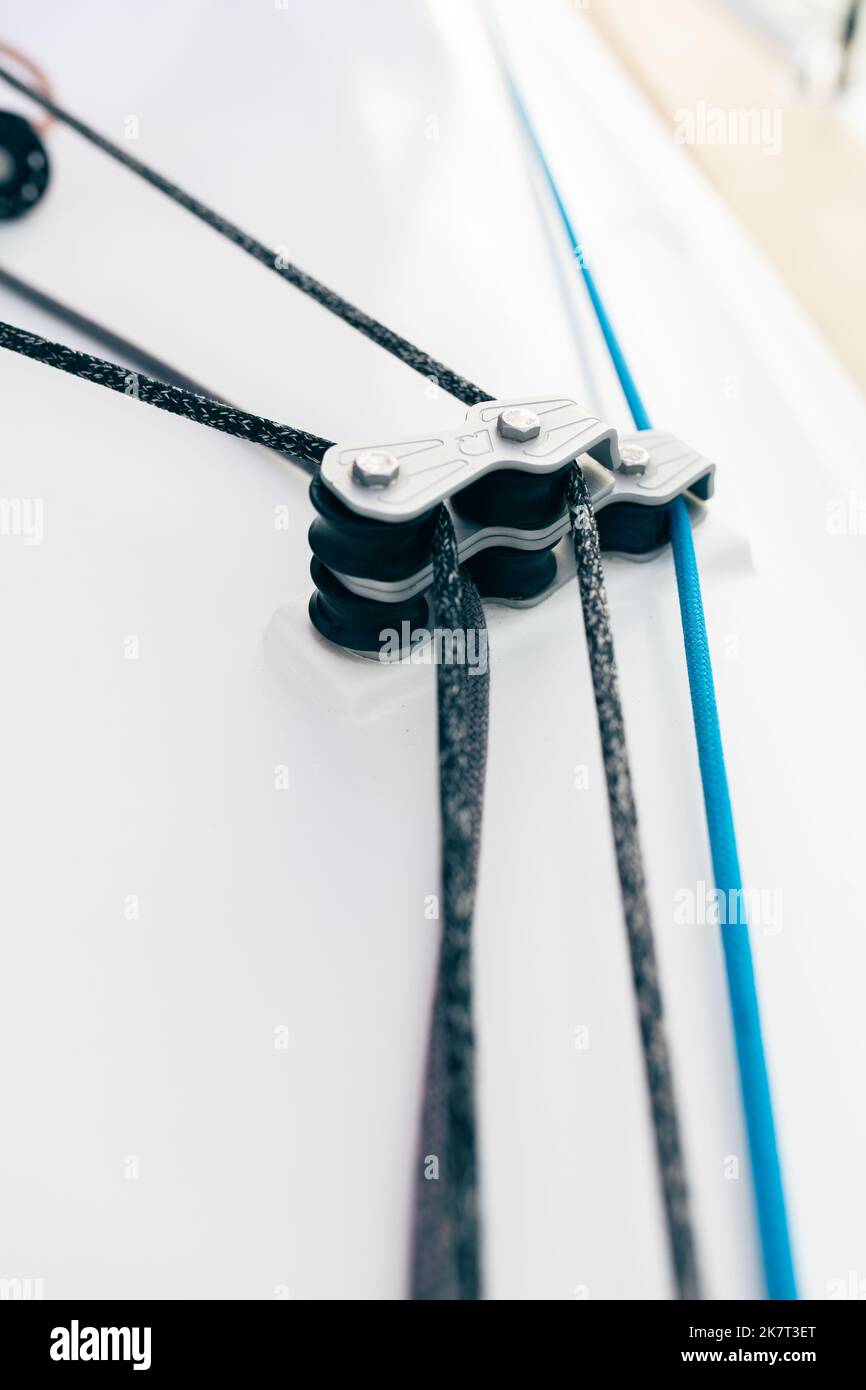 Yacht rigging, ropes and a system of blocks. Vertical photo Stock Photo ...
