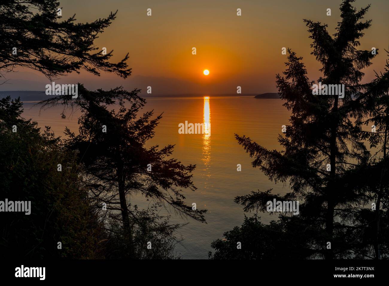 View of the sunset over the Protection Island Aquatic Reserve near Port ...