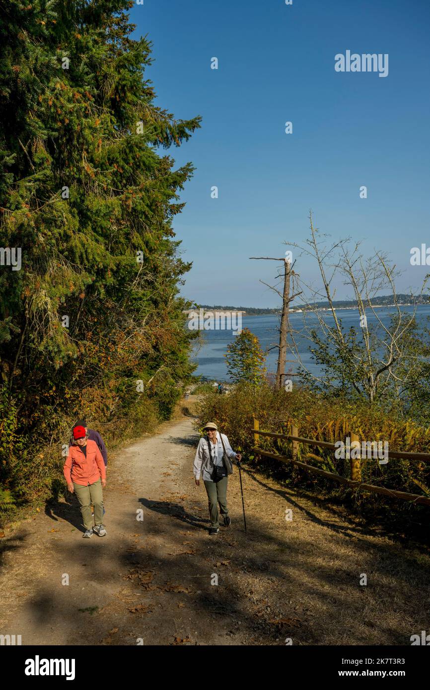 Hikers coming up from the beach at Fort Townsend Historical State Park ...