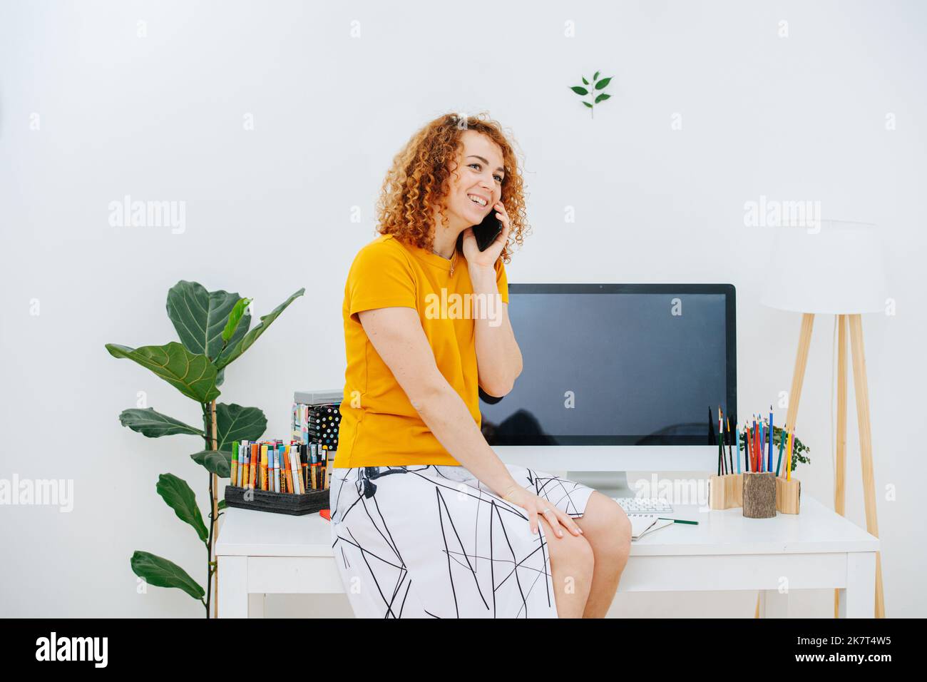 Female at messy desk hi-res stock photography and images - Alamy