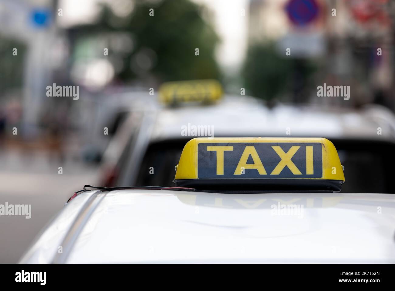 Close up picture of a taxi sign Stock Photo - Alamy