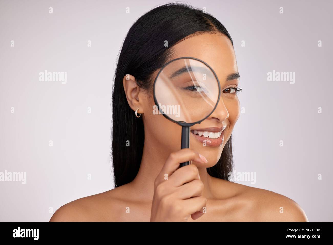Lets take a closer look. Studio portrait of an attractive young woman ...