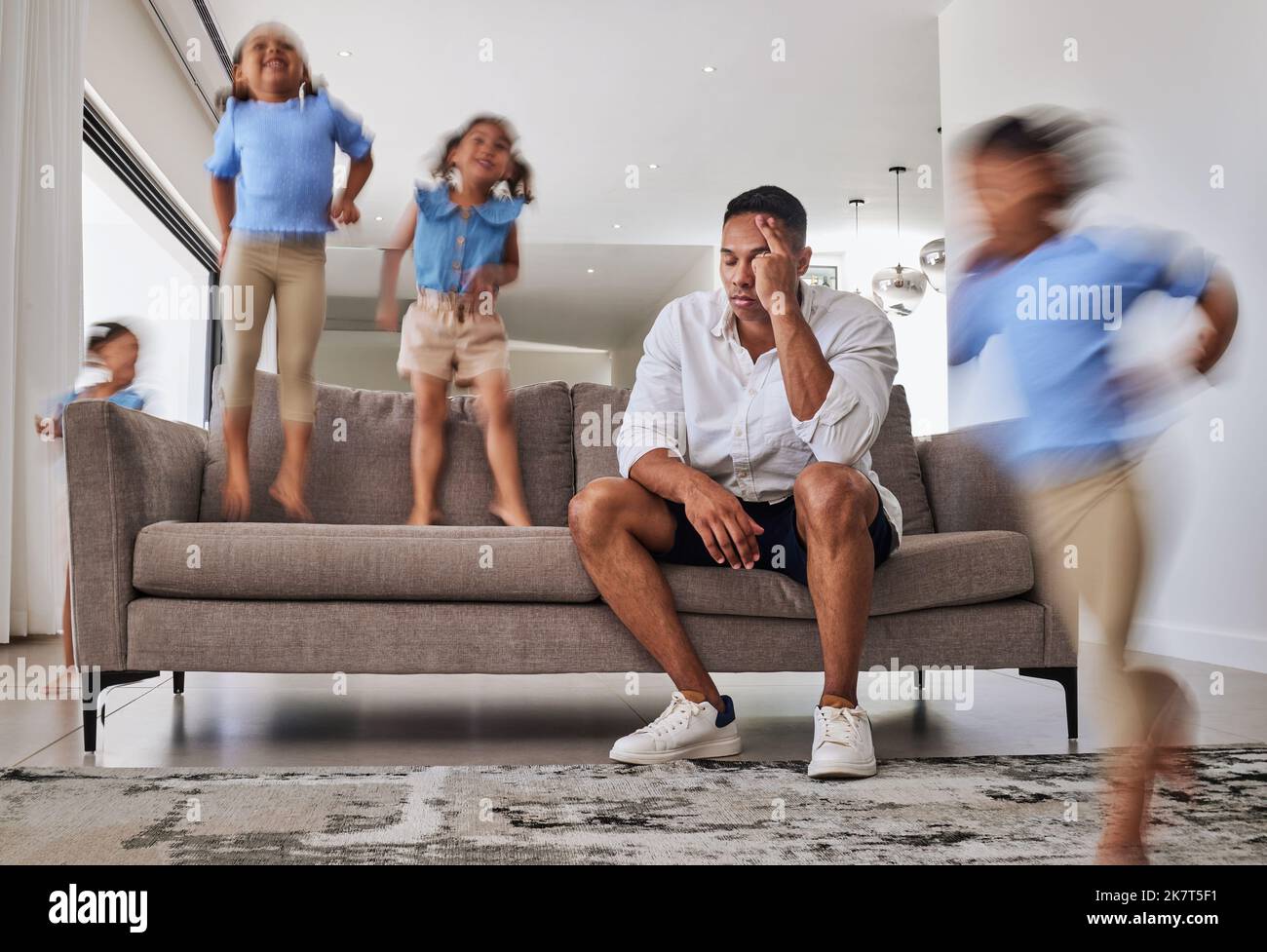Stress, headache and father with adhd kids running, jumping and playing ...