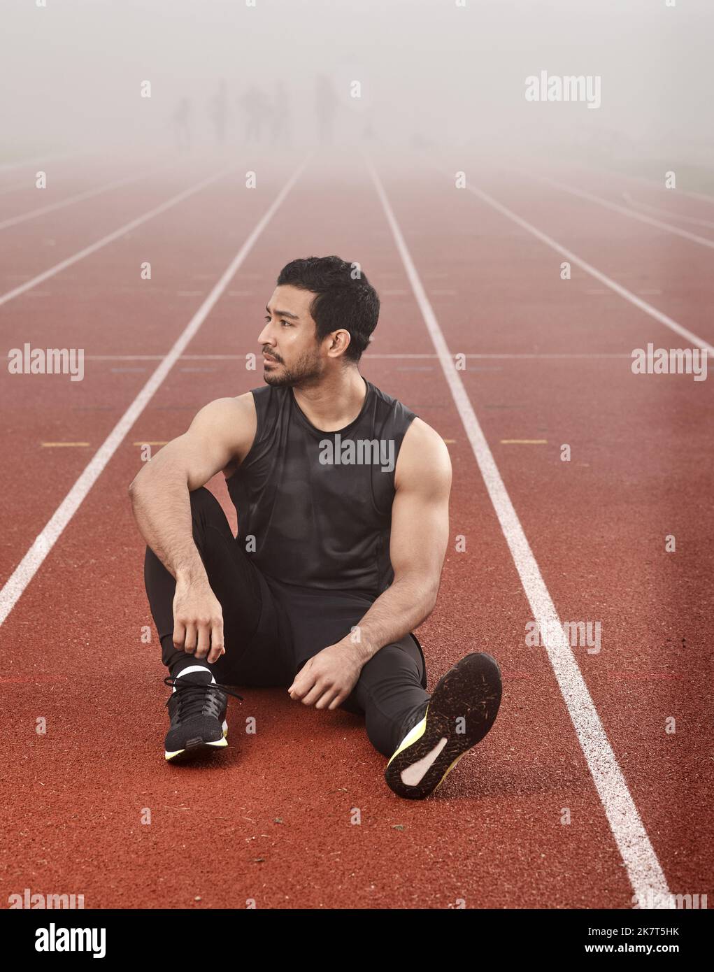 The future you want is waiting for you. a young male athlete sitting on ...