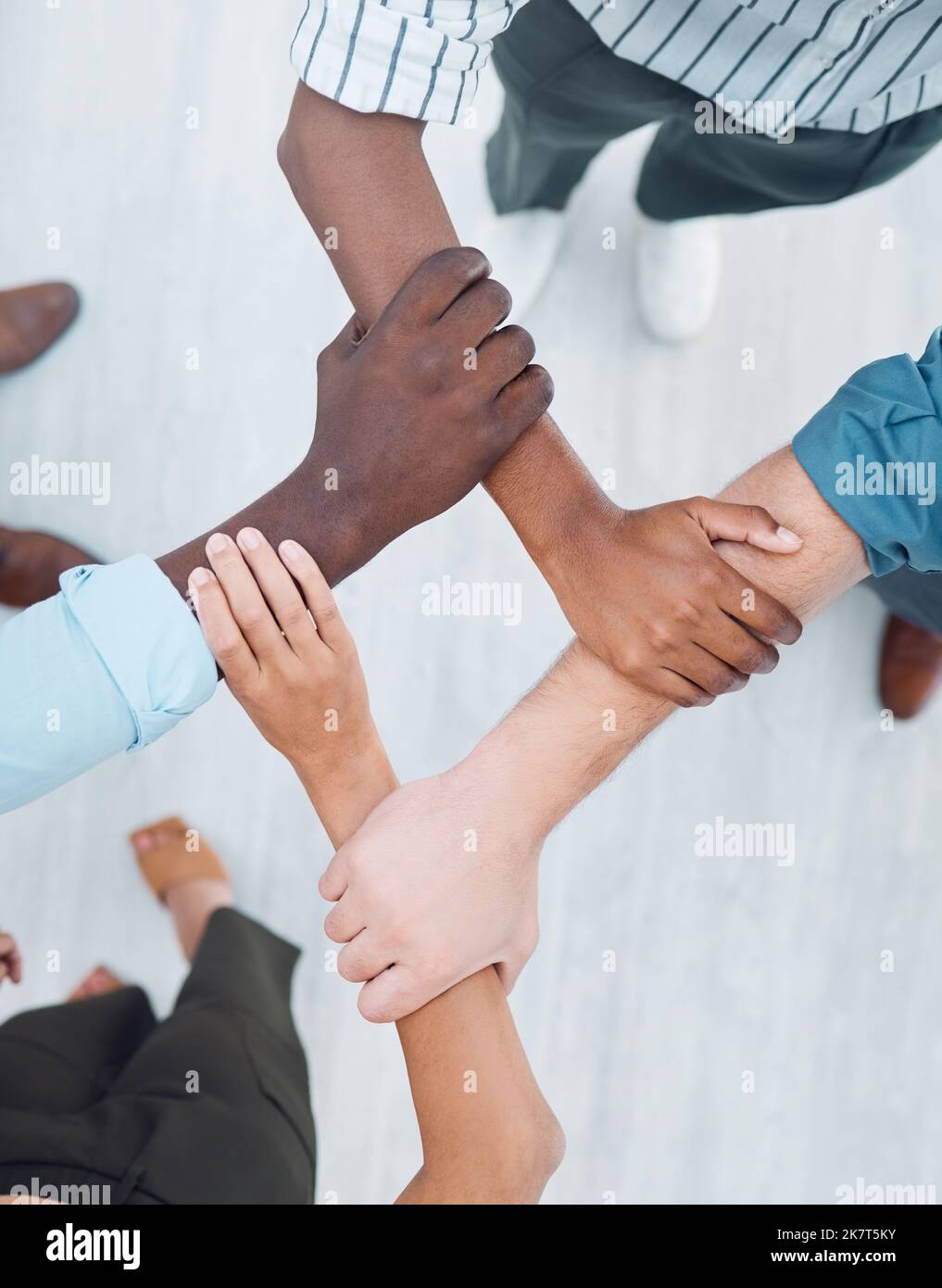 Diversity, support and teamwork with hands of business people holding ... Diversity, support and teamwork with hands of business people holding ...