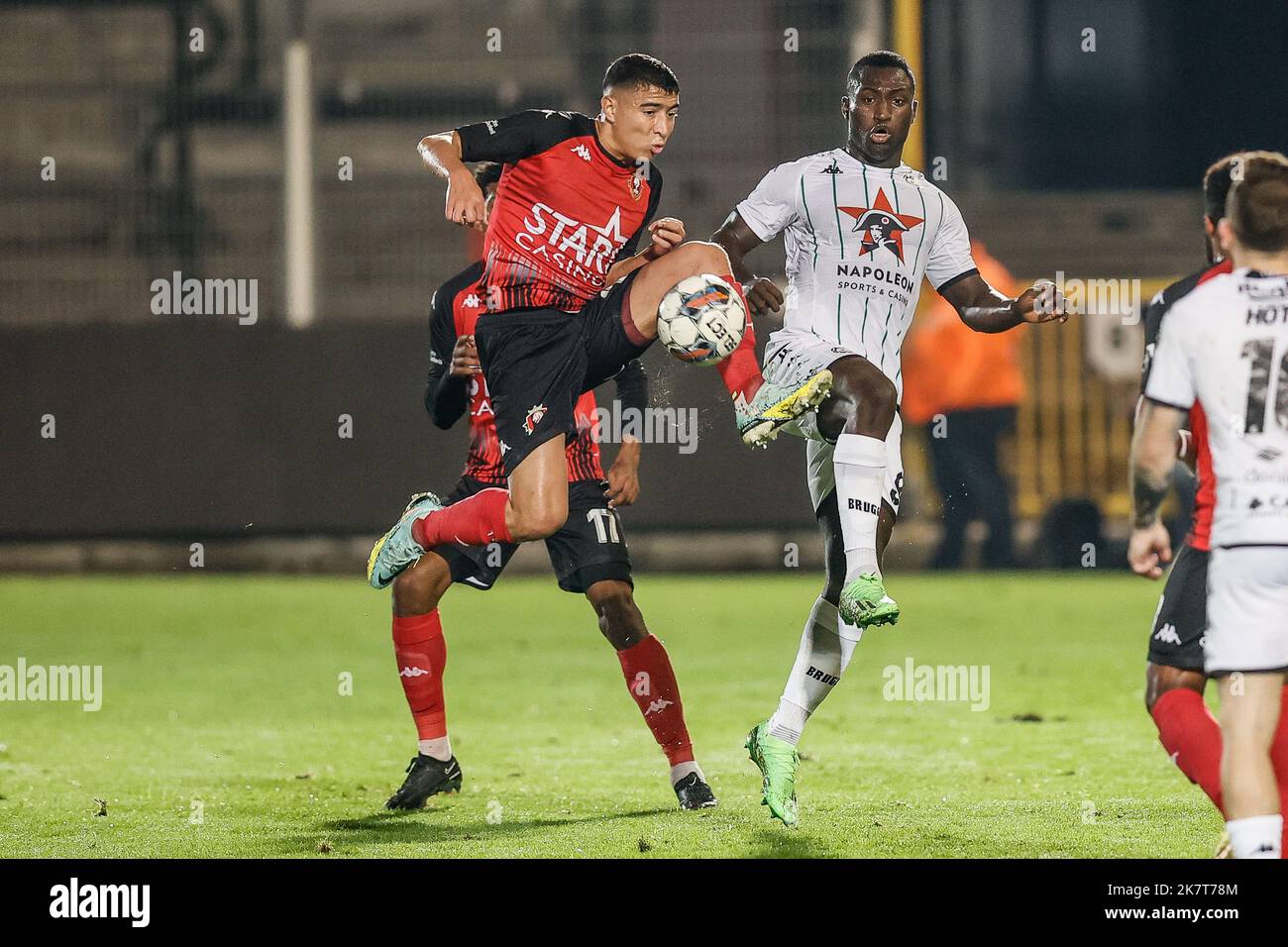 Seraing's Sami Lahssaini and Cercle's Kevin Denkey fight for the ball ...