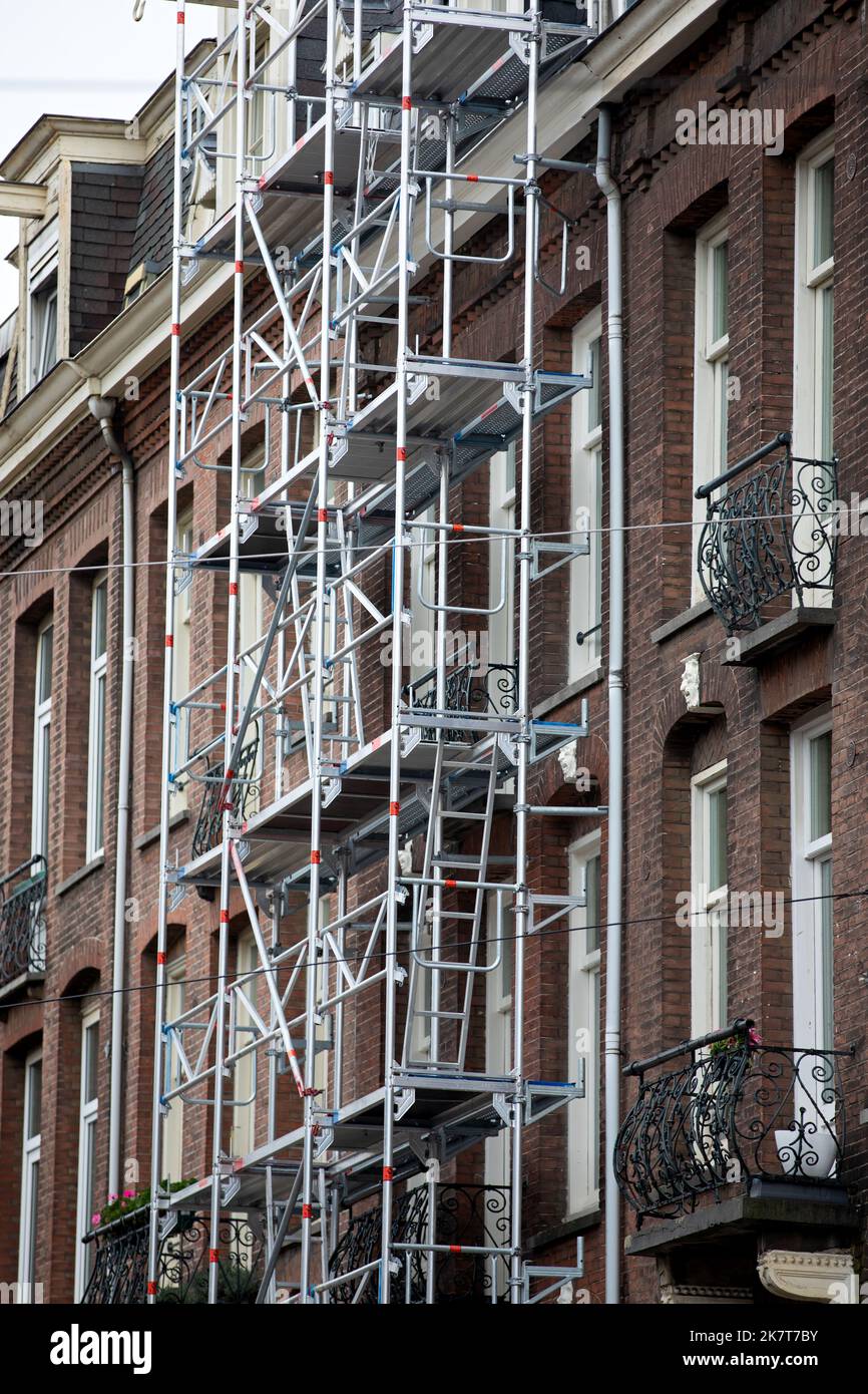 Scaffolding steel frame installation on a construction site Stock Photo ...