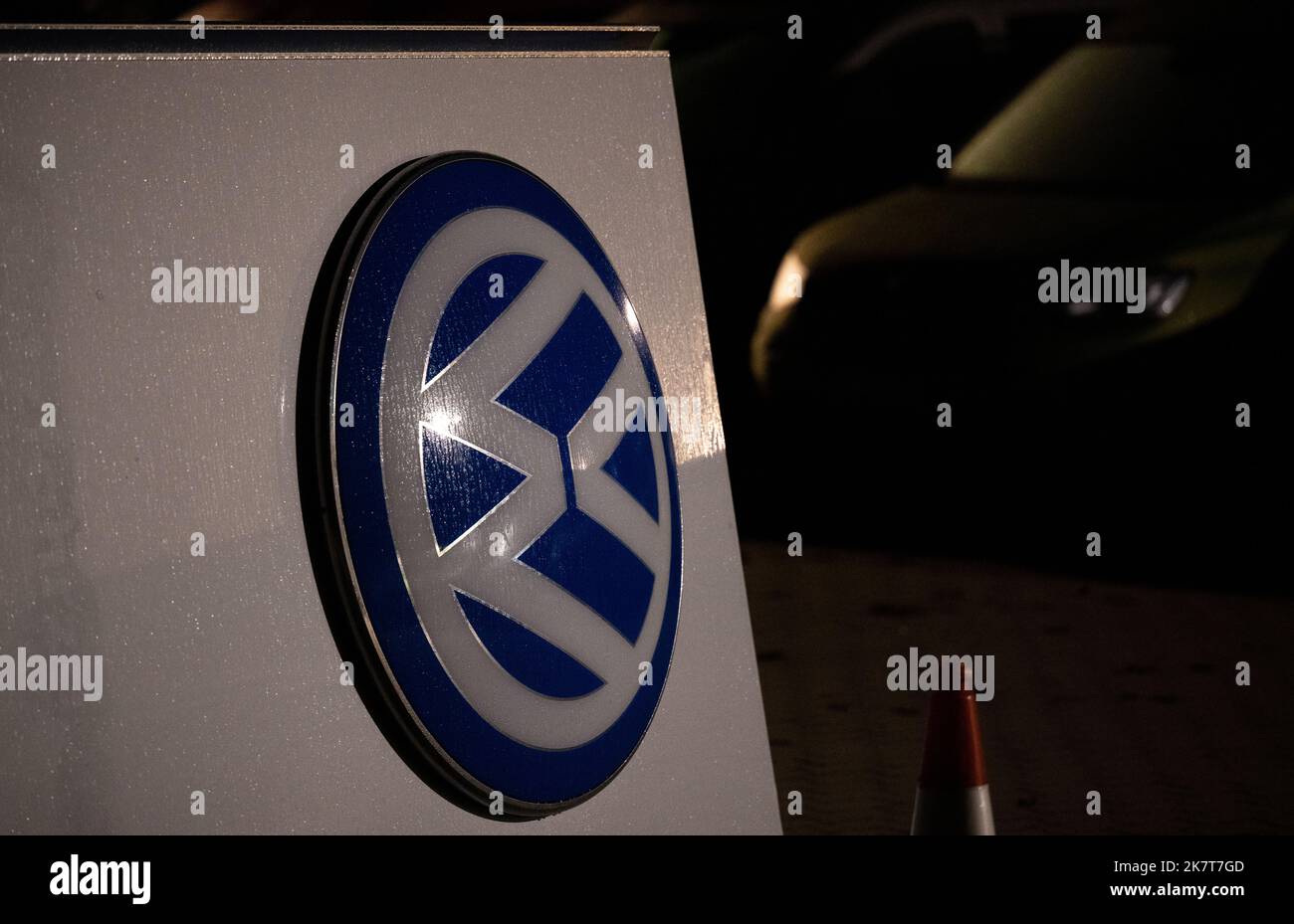 Leipzig, Germany. 19th Oct, 2022. The dismantled old VW logo lies on a ...