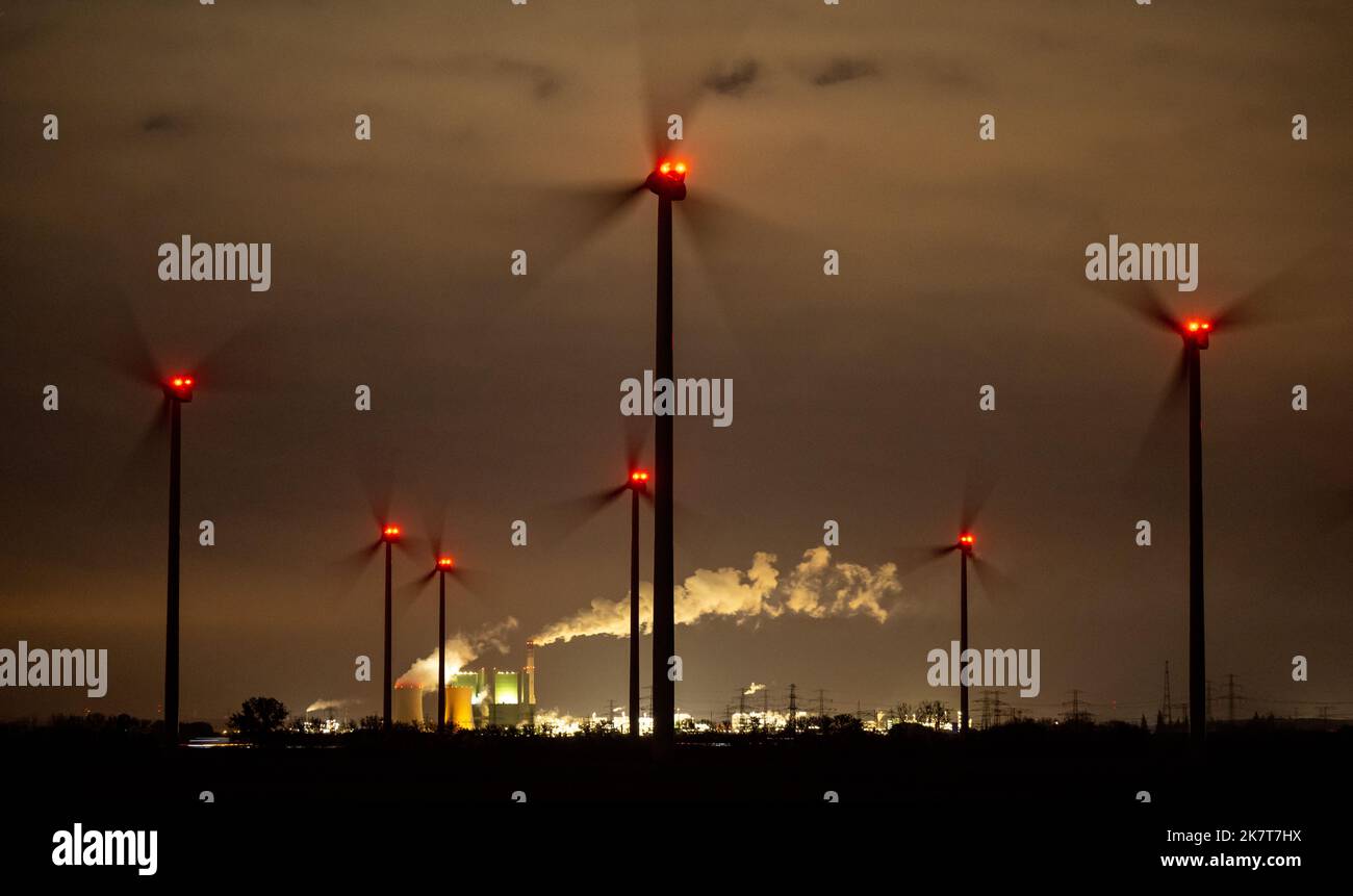 Schkopau, Germany. 19th Oct, 2022. Wind turbines rotate in front of the ...