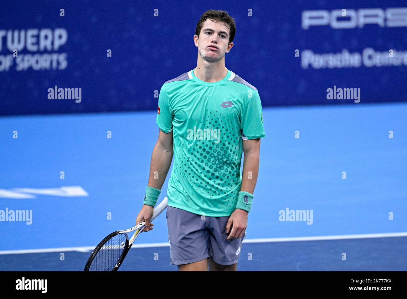 Belgian Gilles-Arnaud Bailly reacts during the men's singles first ...
