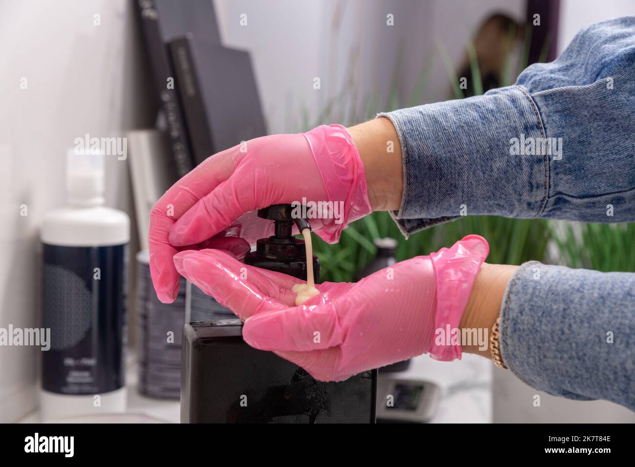 Push dispenser liquid facial fluid gel squeezed out to hand ...