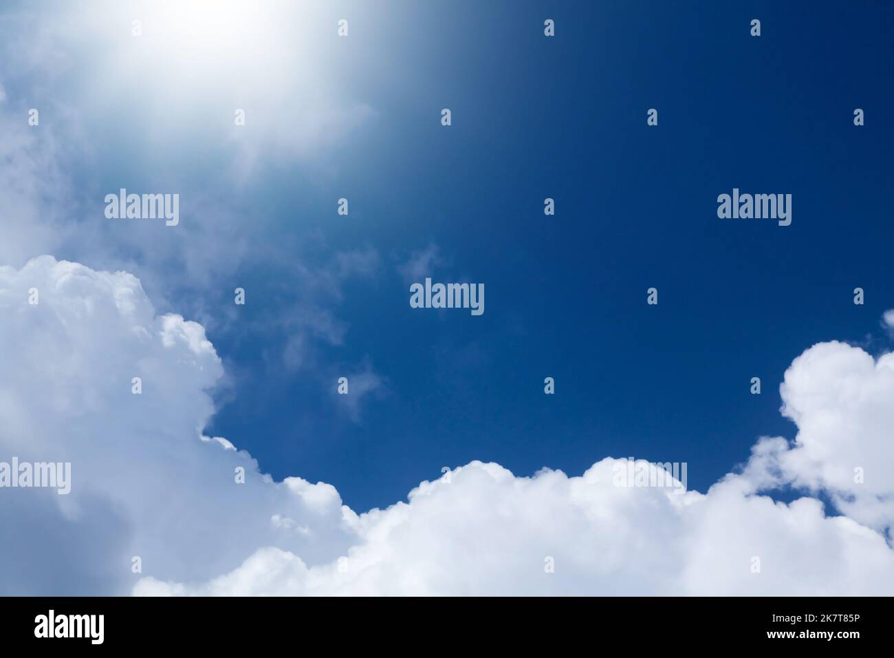 Blue sunny sky with clouds Stock Photo - Alamy