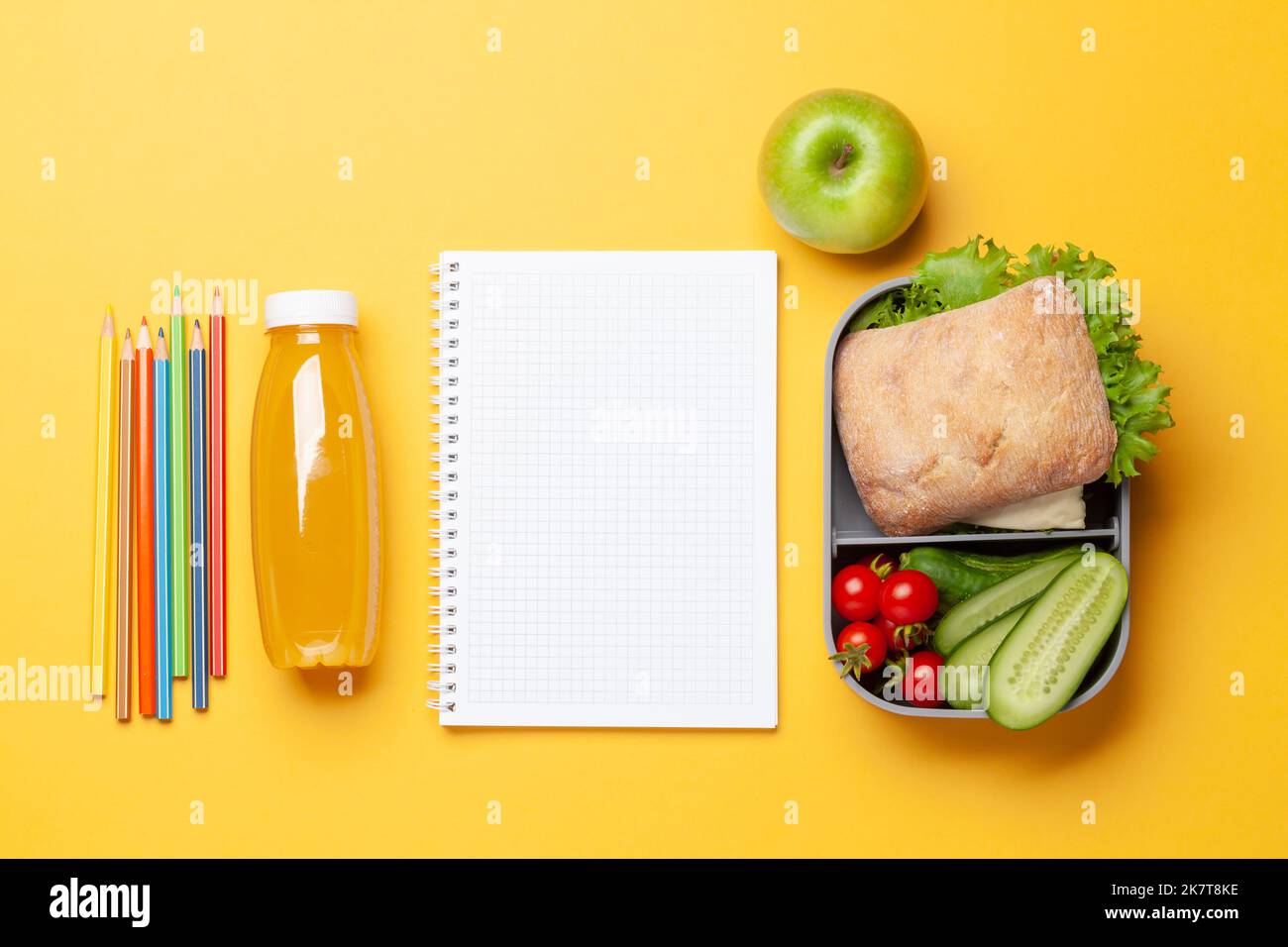 Lunch box with sandwich, vegetables and juice. School or office meal ...