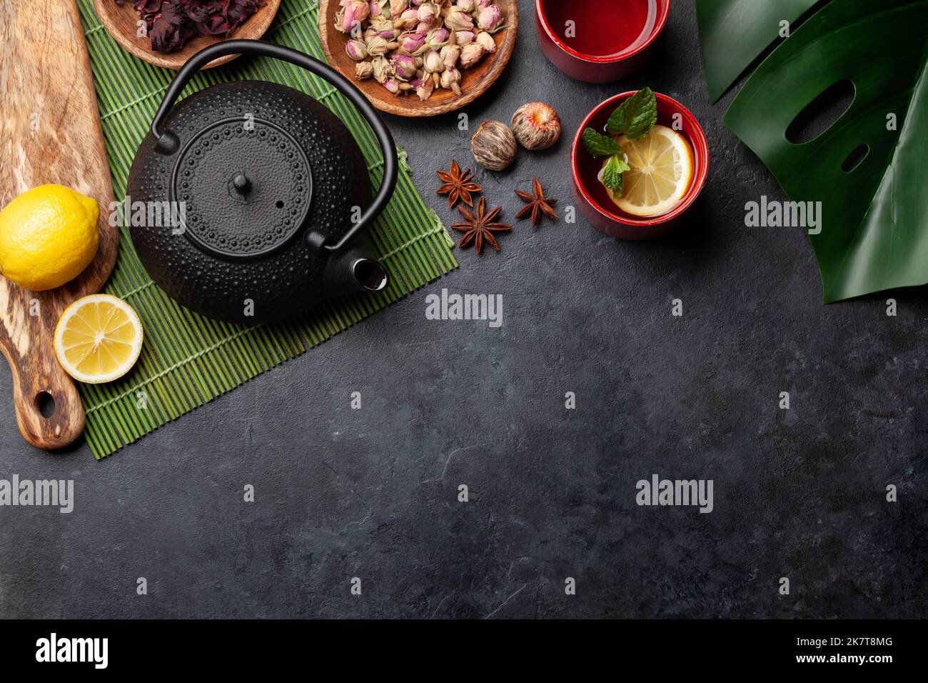 Various dried tea and teapot. Top view flat lay with copy space Stock Photo - Alamy