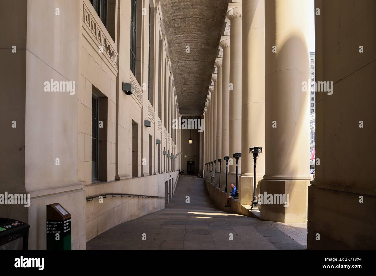 Old restored building - massive columns and a long corridor. Ancient ...