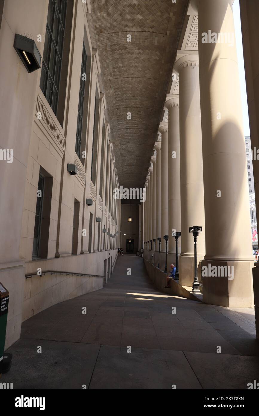 Old restored building - massive columns and a long corridor. Ancient ...
