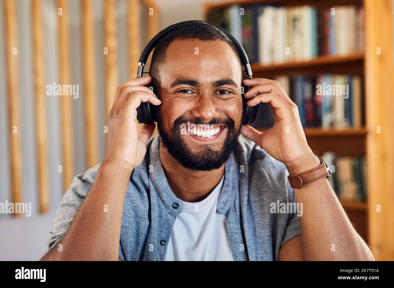 The tunes you choose dictate your day. a handsome young businessman ...