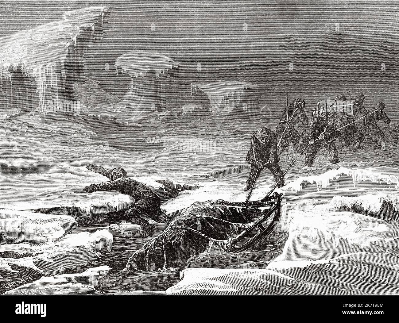 The crew of the Germania pulls an overturned sled into the cold waters ...