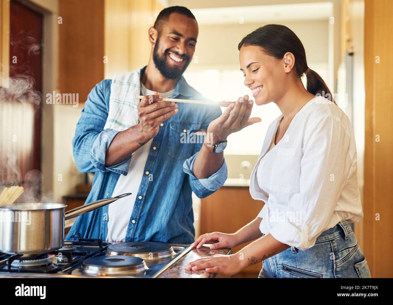 Lets put your cooking to the test. a couple cooking together at home ...