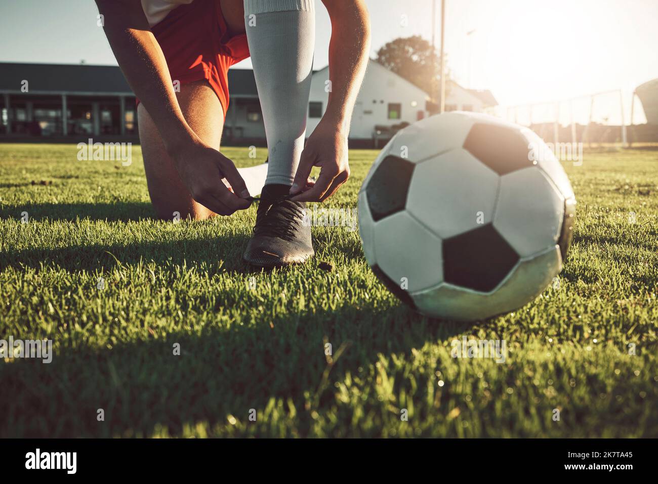 Soccer player tying shoe hi-res stock photography and images - Alamy