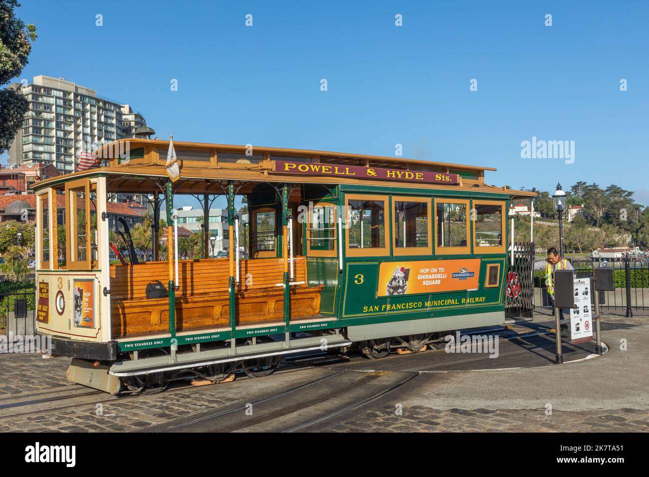 San Francisco, USA - June 6, 2022: conductor turns the cable car at the ...