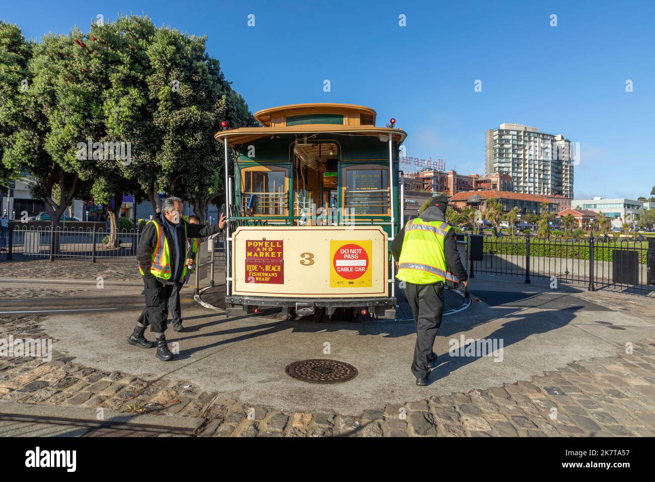 San Francisco, USA - June 6, 2022: conductor turns the cable car at the ...