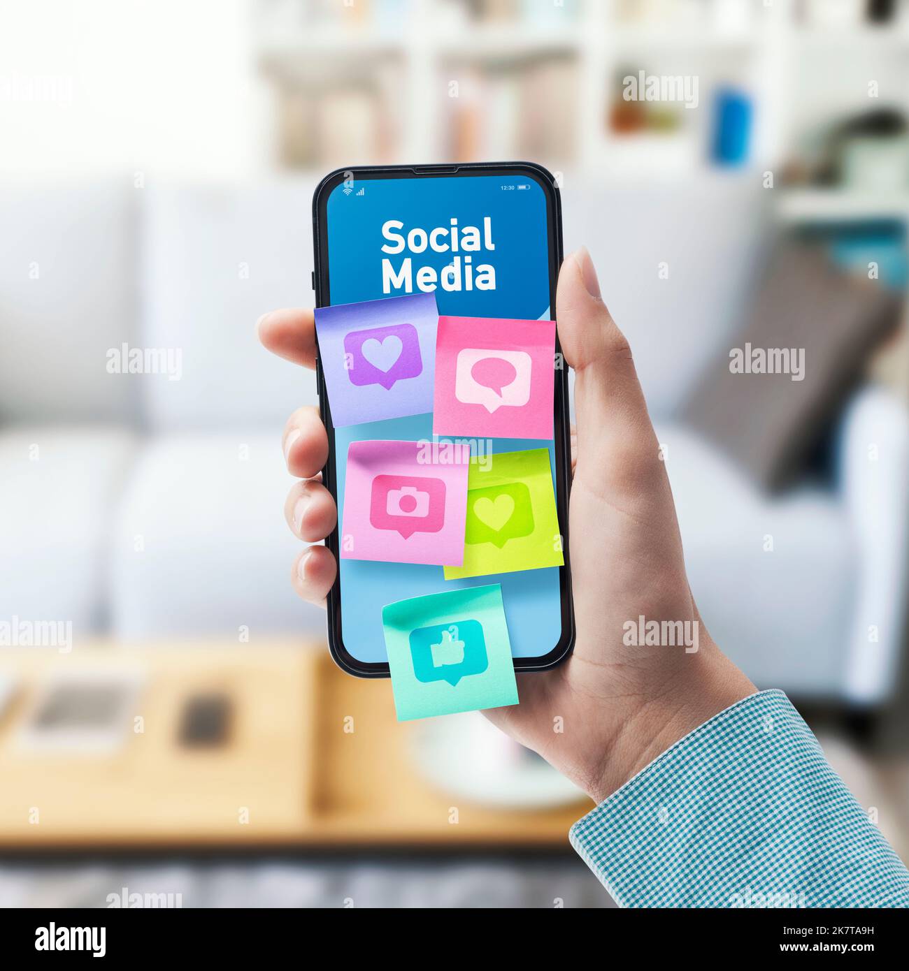 Woman connecting with social media online: sticky notes with icons on ...