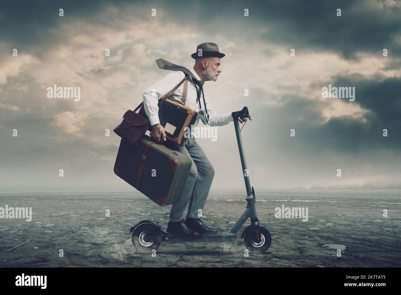 Vintage style traveler and photographer carrying luggage and riding a ...