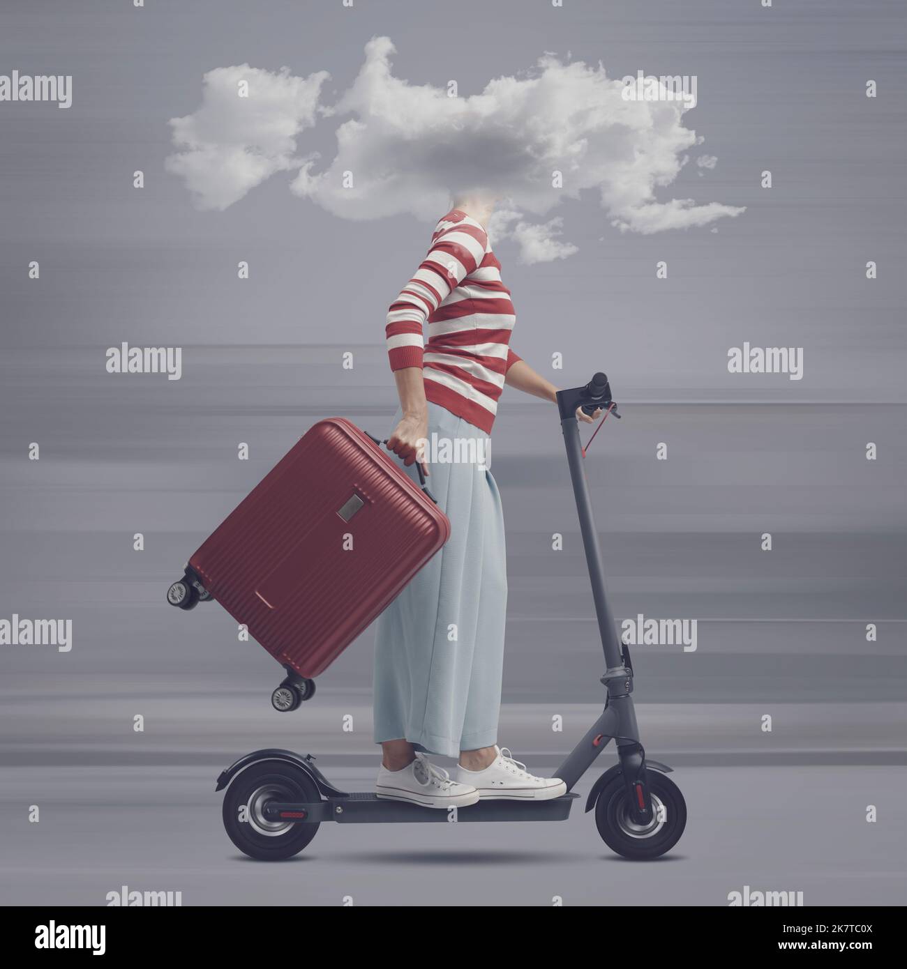 Distracted woman with head in a cloud riding an electric scooter Stock ...