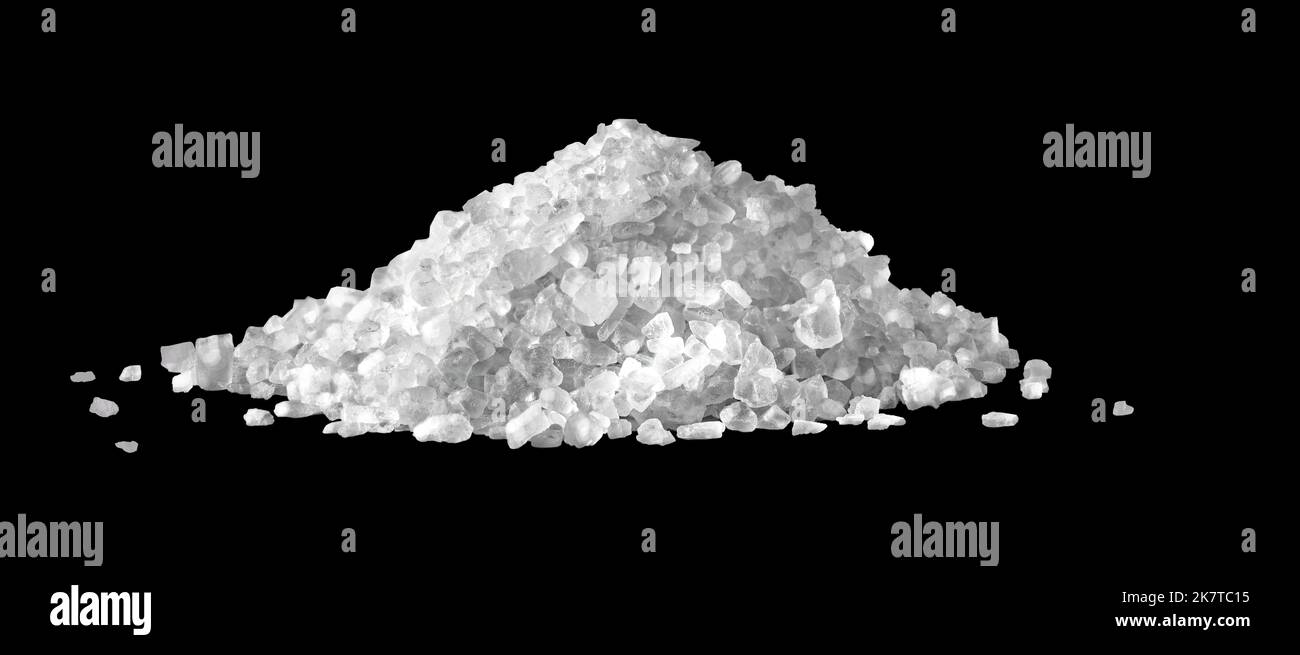A heap of sea salt on black background. with clipping path Stock Photo ...