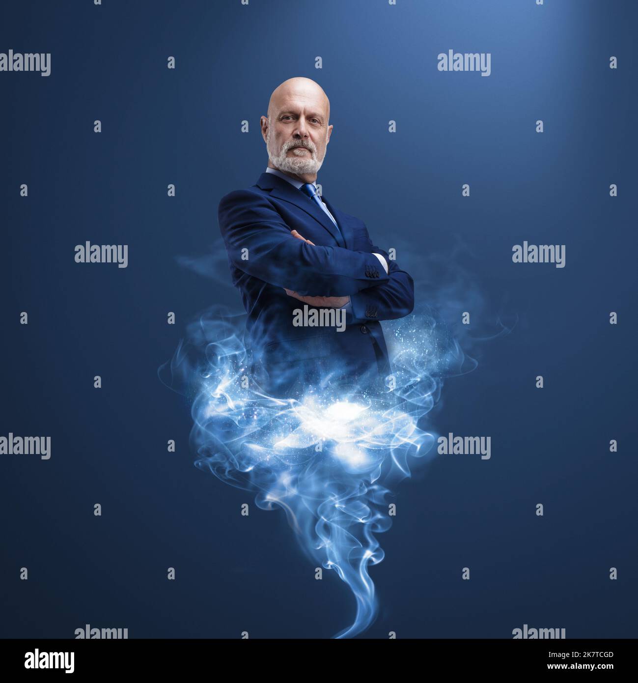 Confident businessman genie appearing and smoke, he is posing with ...