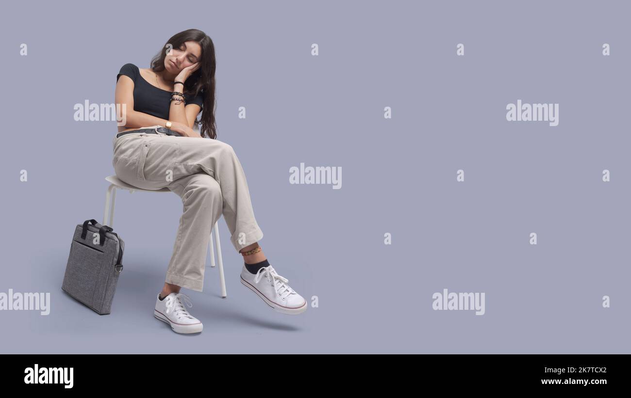 Woman sitting on chair exhausted hi-res stock photography and images ...