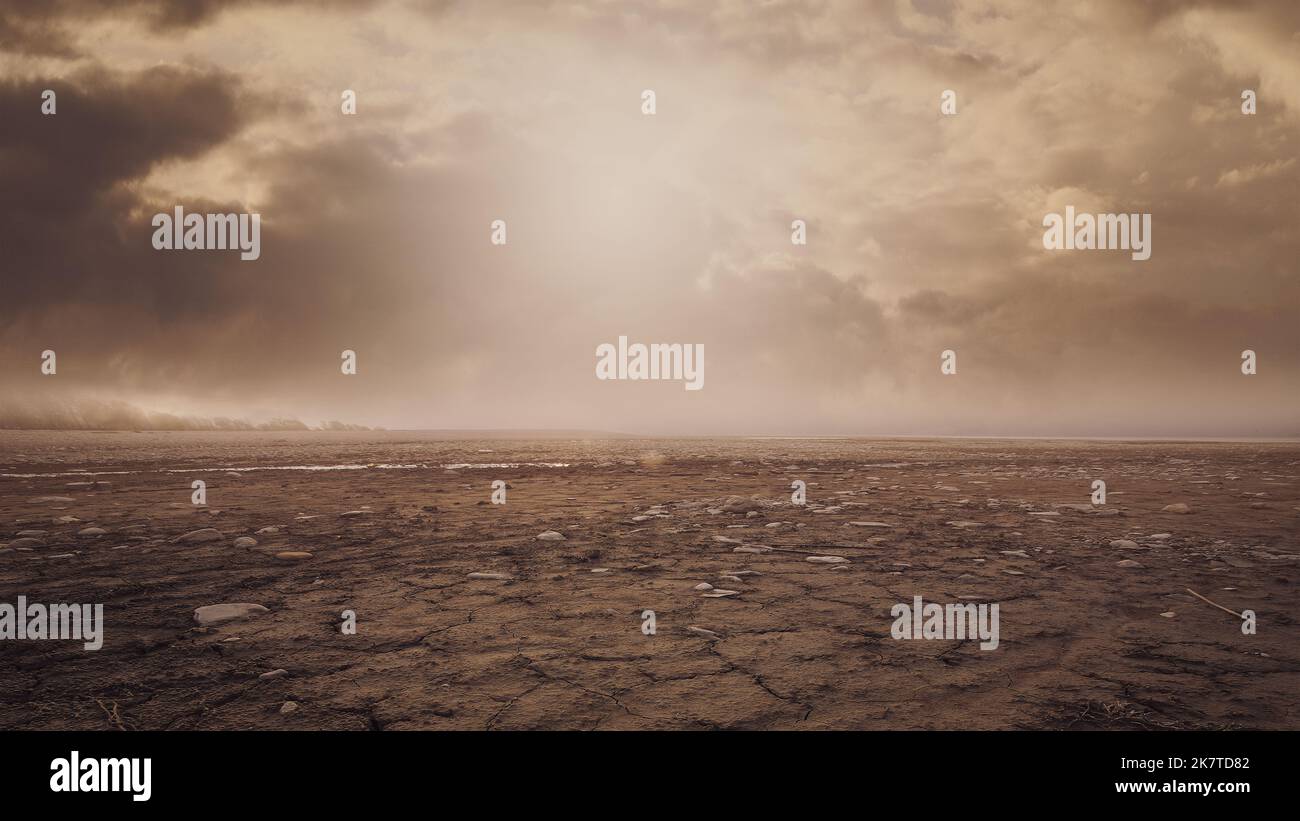 Dry barren land with cloudy polluted sky, climate change and ...
