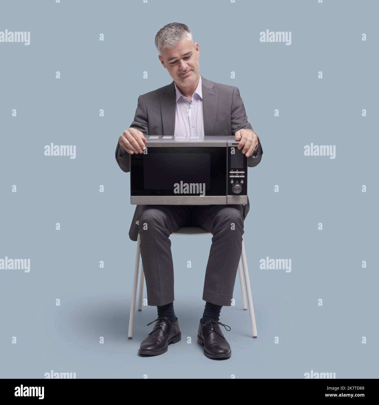 Microwave oven man hi-res stock photography and images - Alamy