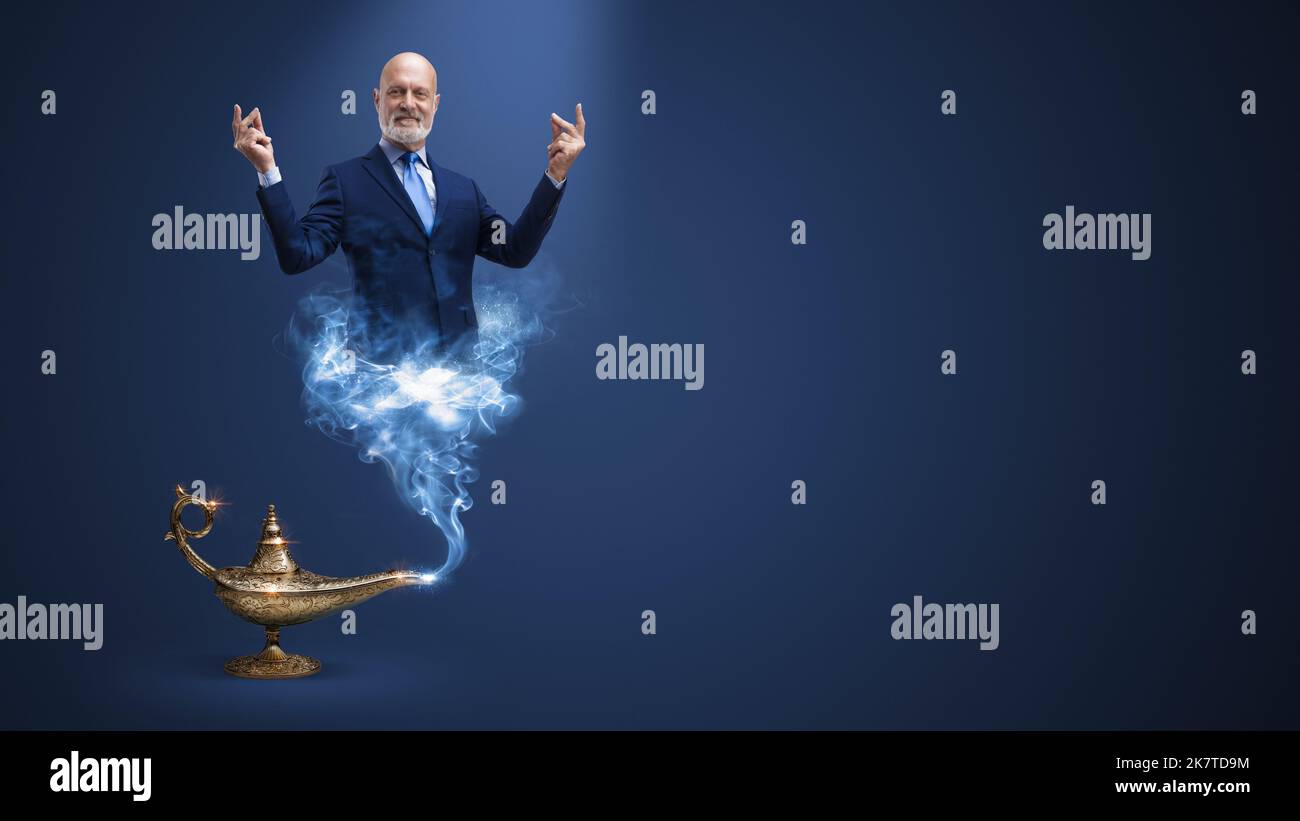 Businessman genie coming out from the lamp and snapping fingers, he is ...